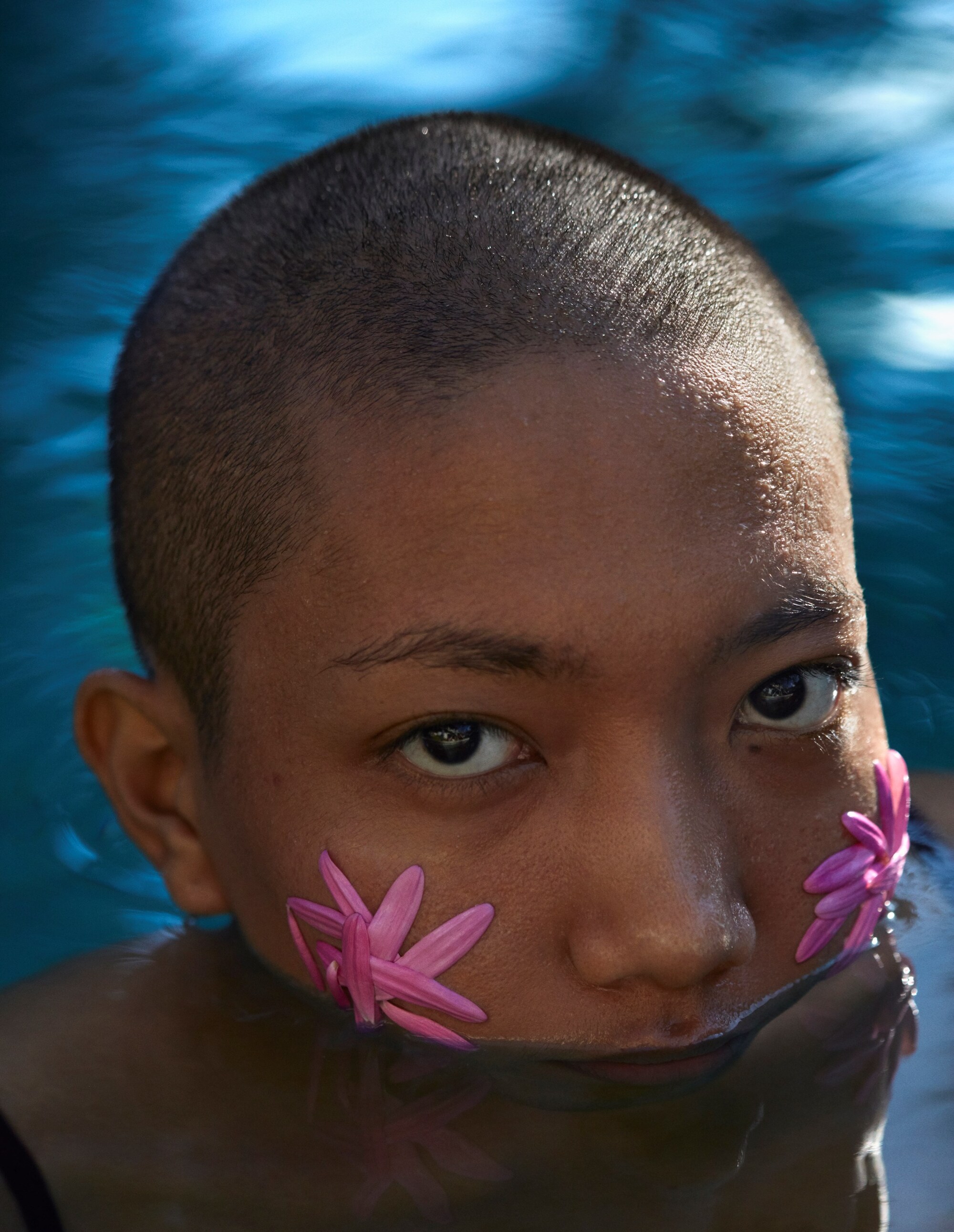 Model Hayati Azis's shaved head defies local Indonesian beauty ...