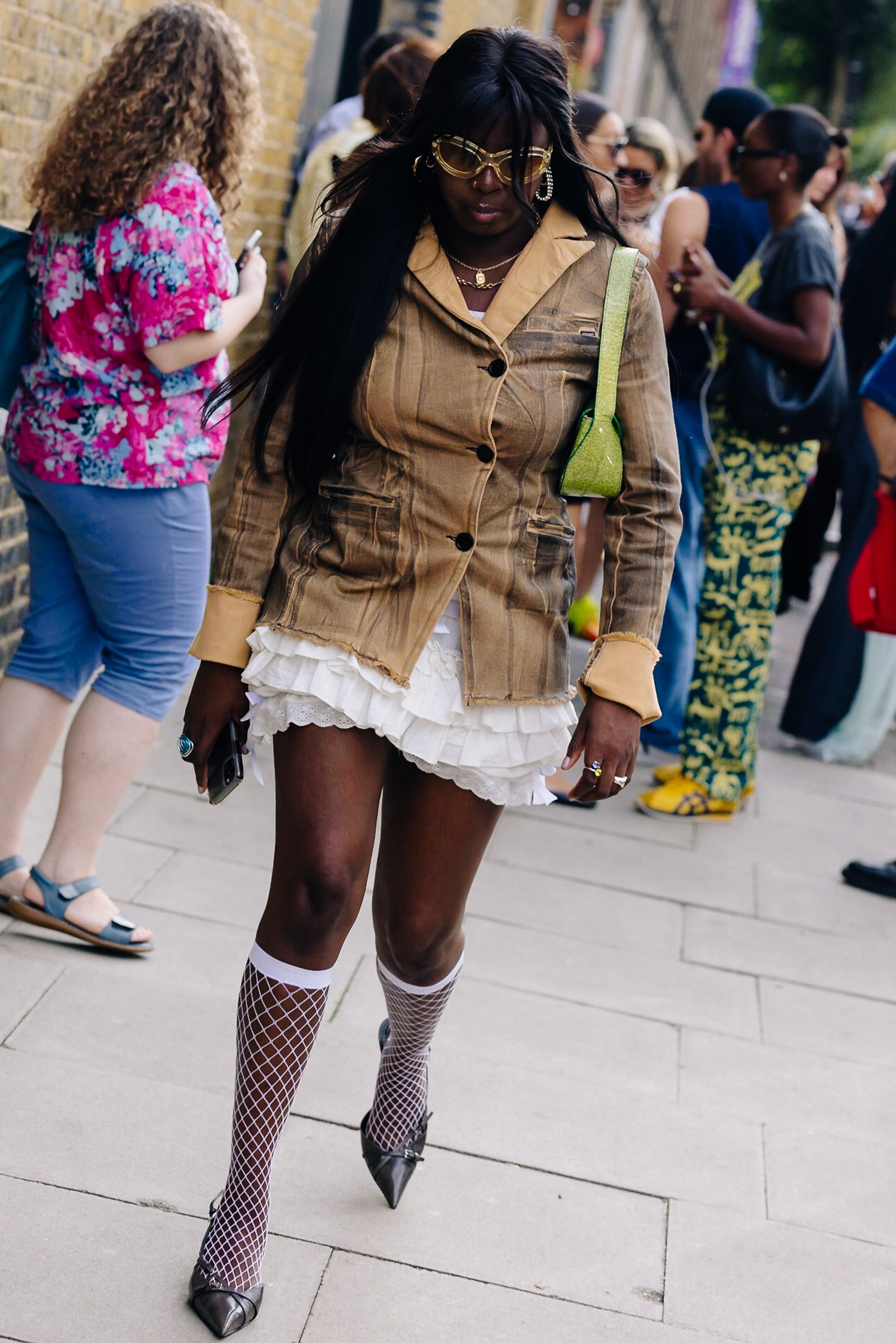 Glued-on bows and gothic tees: more street style from SS24 | Dazed