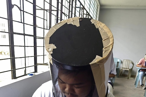 Anti-cheating hats | Dazed