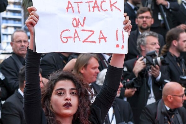 Filmmakers protest in solidarity with Palestine at Cannes | Dazed