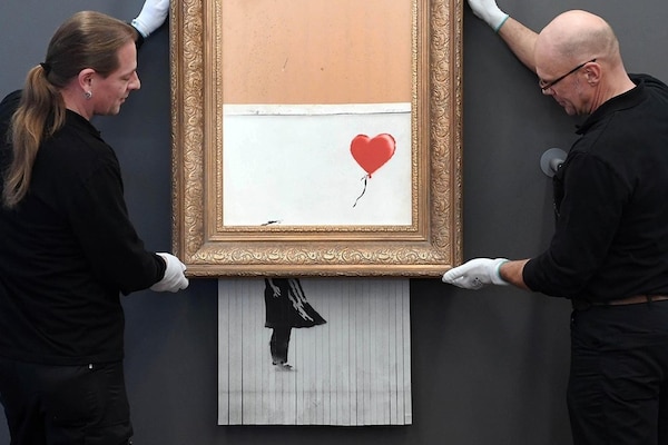 Banksy’s self-destructing artwork breaks records in £18.6 million sale ...