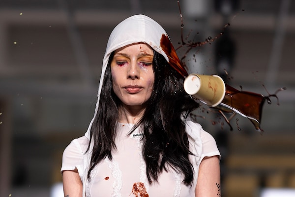 The audience just threw actual trash onto the runway in Milan ...